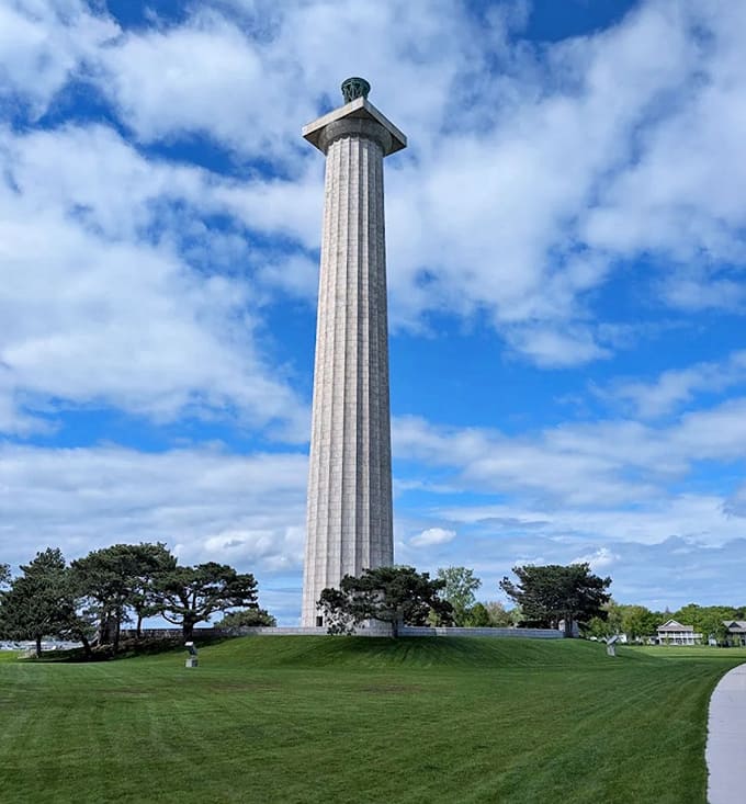 Perry's Victory Memorial stands tall against azure skies, a 352-foot limestone exclamation point celebrating peace across borders.