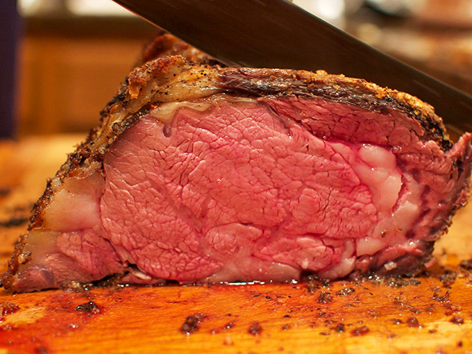 Behold the crown jewel of Red's kitchen &ndash; prime rib so perfectly marbled and tender, it practically dissolves on contact with your tongue.