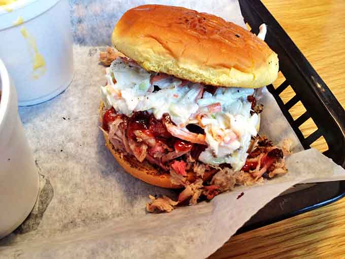 This isn't just a pulled pork sandwich &ndash; it's a masterclass in smoke, spice, and everything nice, topped with cooling slaw.