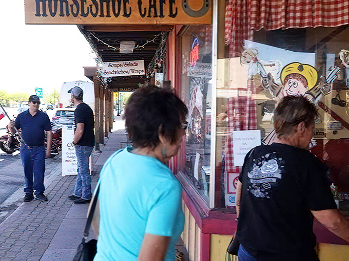 Locals and visitors alike gather outside the Horseshoe Cafe, where breakfast has been fueling cowboys and travelers since the 1930s.