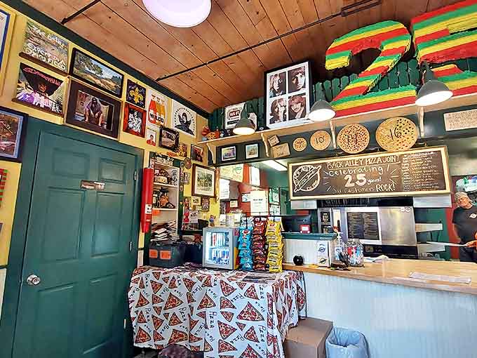 The colorful interior walls showcase decades of local memorabilia, creating an atmosphere that's equal parts community scrapbook and pizza paradise.