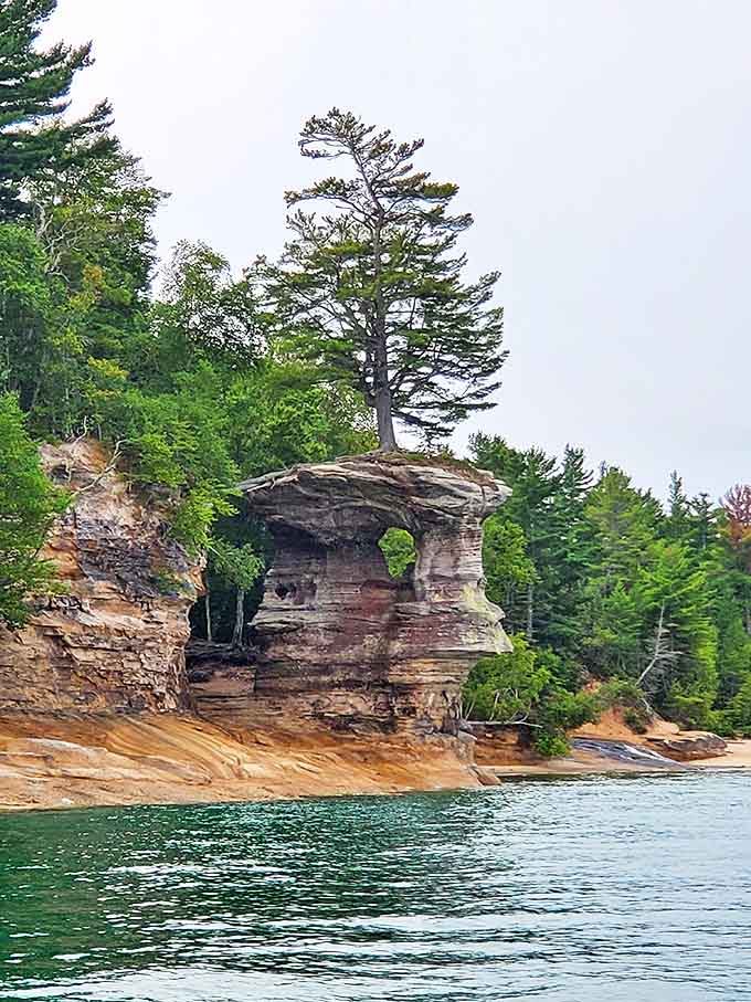 This dramatic rock formation stands like a sentinel over Lake Superior, shaped by millennia of waves and weather into nature's sculpture.