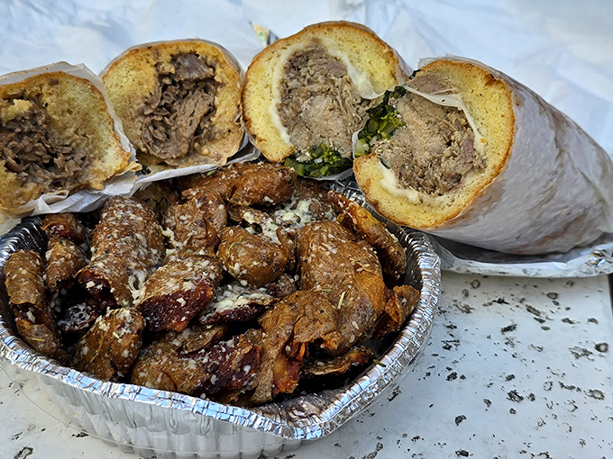 Sandwich Spread: Behold the cross-section of sandwich perfection—layers of thinly sliced beef nestled alongside those heavenly spuds.