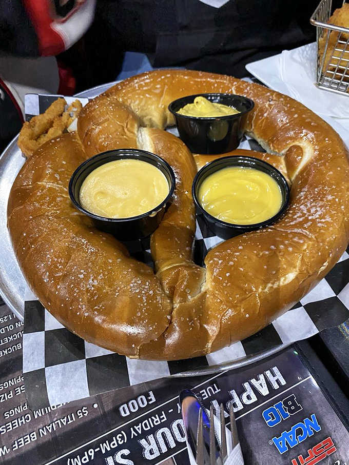 This golden-brown beauty comes with dipping sauces that make you question why all pretzels aren't this massive and delicious.