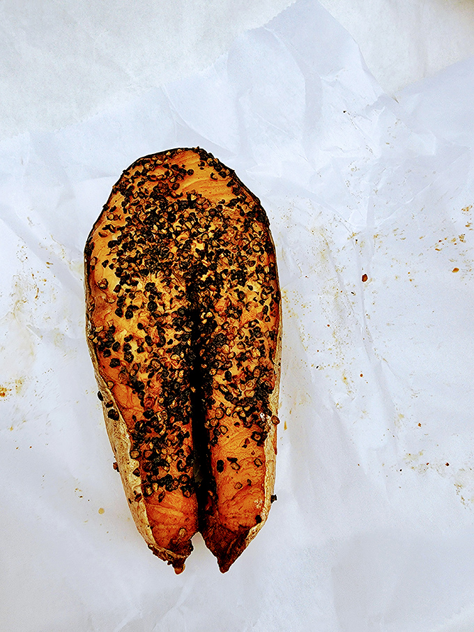 Glistening with pepper-crusted glory, this oak-smoked beauty makes you wonder why you'd ever eat salmon prepared any other way.