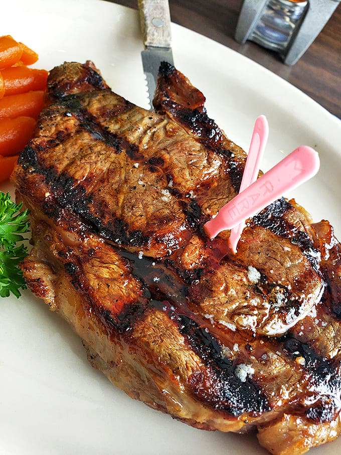 Ribeye Steak: This isn't just a steak, it's a masterpiece of meat with a sear so perfect it deserves its own fan club.