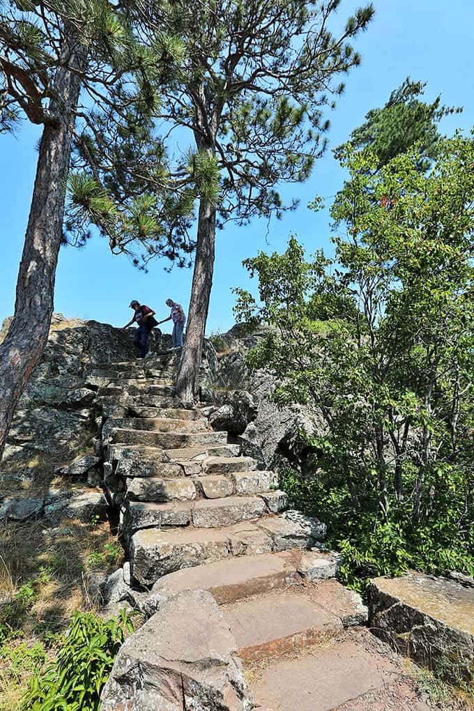 Stone steps carved by time and craftsmanship lead adventurers down to discover Lake Superior's hidden treasures.