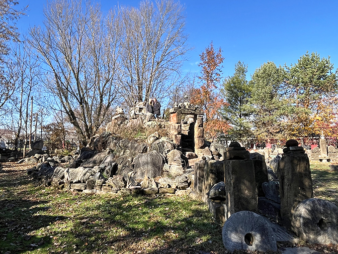 The Temple of Tolerance's mysterious stone formations create a backyard sanctuary that feels both ancient and timeless.