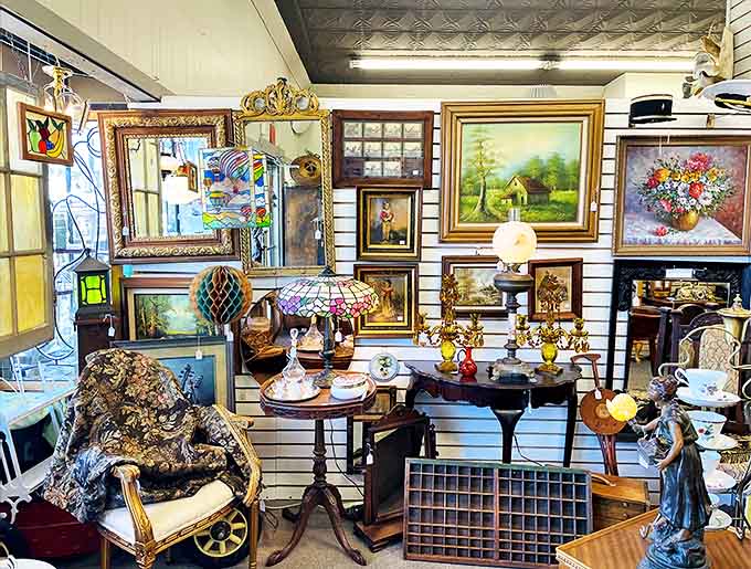 A gallery of framed memories adorns the wall, vintage portraits and landscapes creating a time-traveling art exhibition for modern eyes.