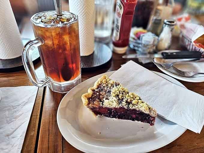 This isn't just pie – it's a triple-berry revelation with a perfectly flaky crust, paired with sweet tea so refreshing it deserves its own fan club.