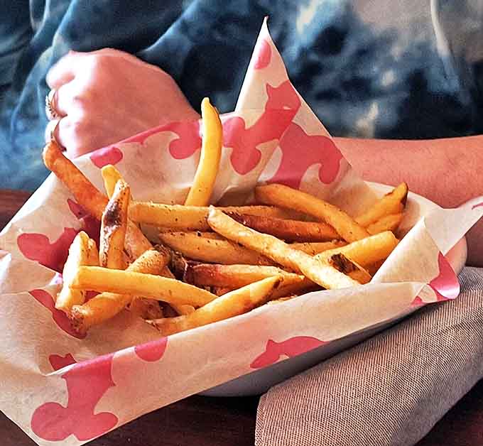Golden, perfectly crisp fries nestled in wax paper &ndash; simple pleasures done right are what keep locals coming back to Turk's decade after decade.