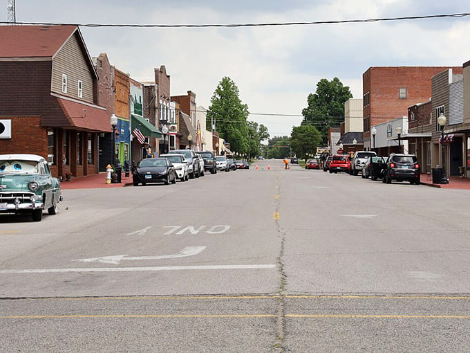 Looking up Market Street reveals the charming blend of historic architecture and superhero whimsy that defines this unique Illinois town.