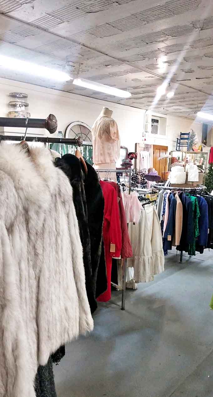 Vintage furs and retro threads hang like a time capsule from when fashion had more personality than a smartphone.