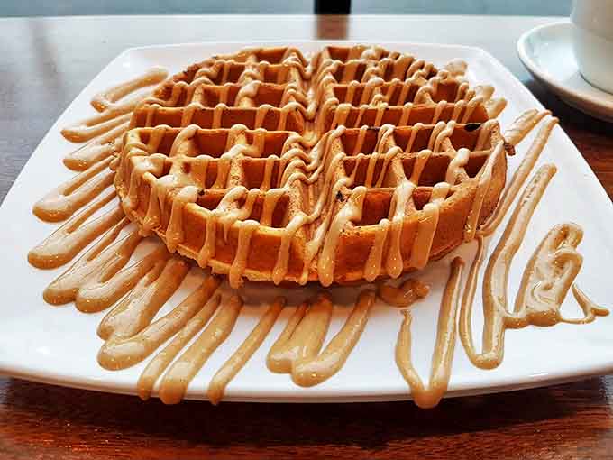 Golden-brown perfection with rivers of caramel cascading down each square valley, creating a topographic map of deliciousness.