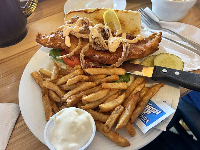 This isn't just fried fish &ndash; it's walleye elevated to art form, golden-crisp outside, flaky-tender inside, with fries that demand to be savored.