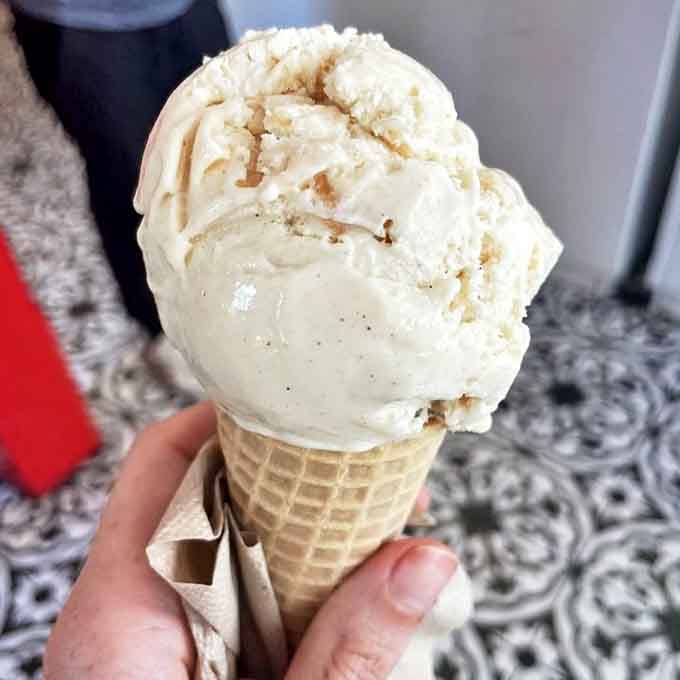 This scoop of creamy vanilla bean isn't just ice cream&mdash;it's edible nostalgia, churned with care and served with pride in a hand-rolled waffle cone.