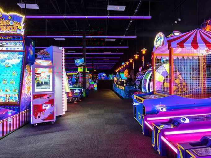 Glowing arcade signs beckon gamers of all generations to test their skills and collect tickets for prizes they absolutely don't need.