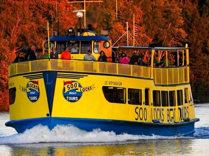 The bright yellow tour boat promises up-close encounters with engineering marvels, turning casual tourists into temporary maritime enthusiasts who suddenly care deeply about lock systems.