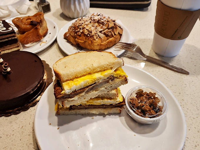 This breakfast sandwich isn't just food &ndash; it's edible architecture with perfectly scrambled eggs and melted cheese creating a morning masterpiece.