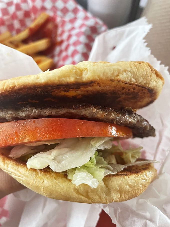 This isn't just a burger; it's edible poetry &ndash; hand-formed patty, garden-fresh toppings, and a bun that knows its supporting role perfectly.