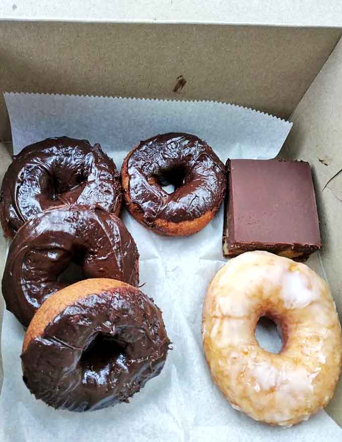 Chocolate-glazed donuts that would make Homer Simpson weep with joy – these aren't just treats, they're life-affirming experiences with sprinkles.