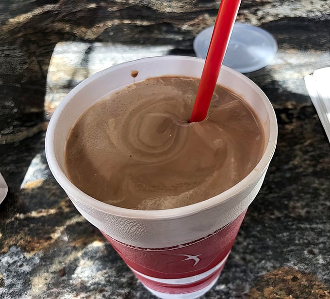 A chocolate shake so thick and velvety it demands a moment of silence before the first heavenly sip.