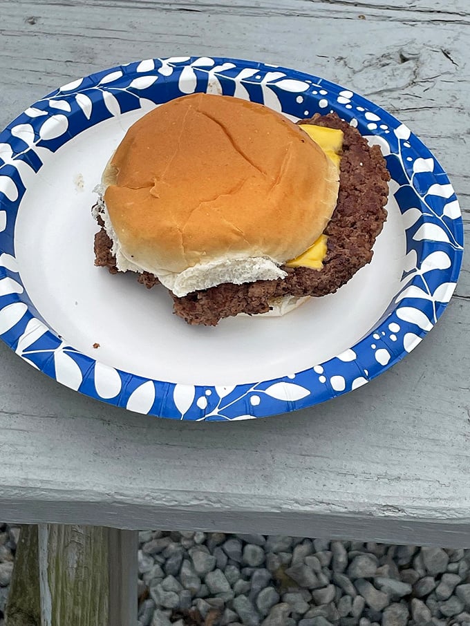 Behold the legendary Moonshine burger &ndash; no fancy frills, just perfectly seasoned beef on a soft bun that's worth every mile of the journey.