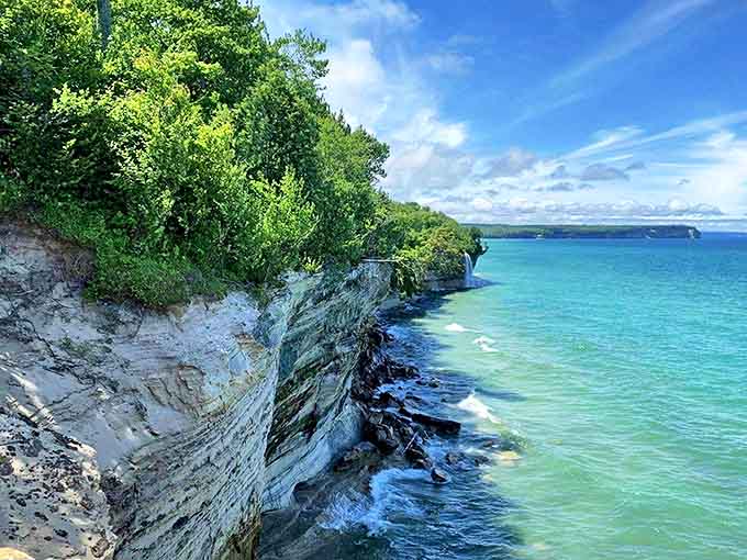 Standing at the edge where forest meets lake, you realize some views are worth every step of the journey to get there.