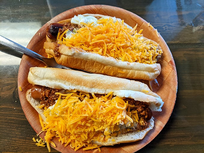 Coney dogs loaded with that secret-recipe chili and a snowfall of shredded cheddar &ndash; simple perfection that needs no fancy description.