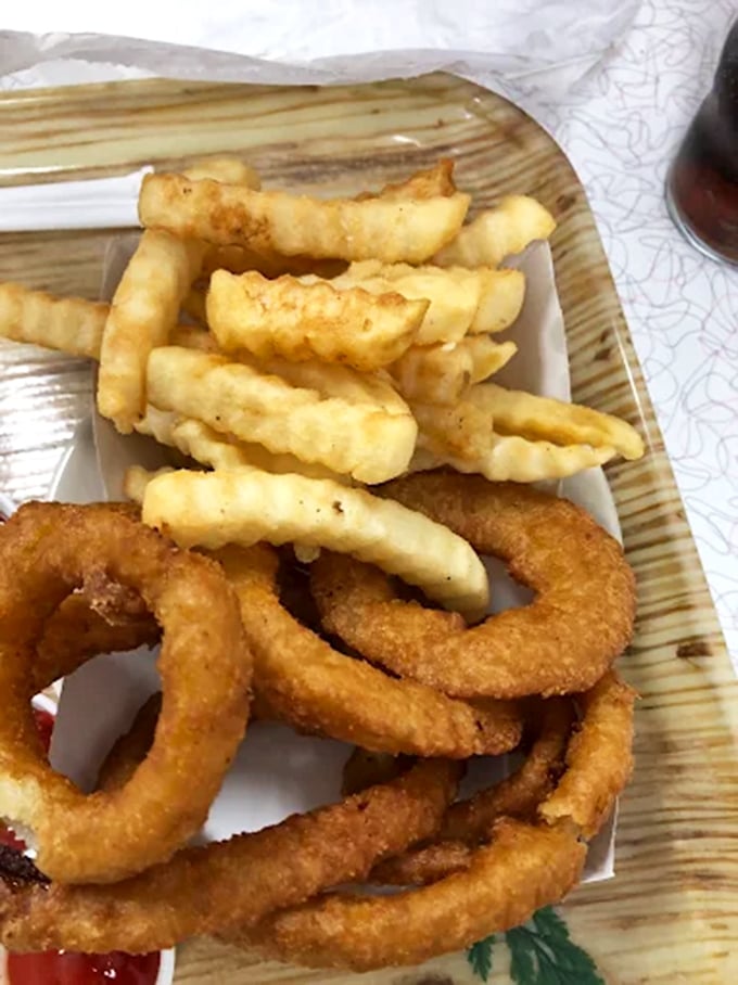 French fries and onion rings: Golden, crispy perfection that puts modern fast food to shame. Those onion rings deserve their own fan club.