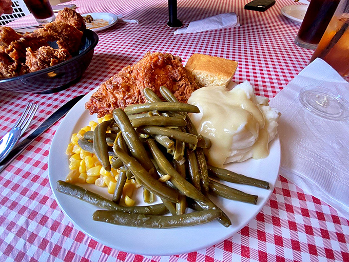 Golden-brown fried chicken with all the fixings &ndash; this plate earns straight A's in both presentation and flavor.