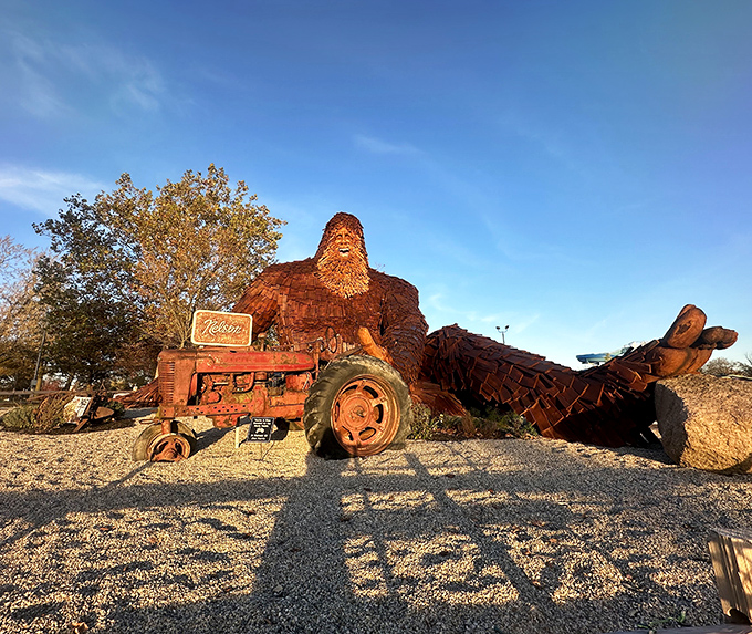 Bigfoot and his trusty tractor, chilling out under a beautiful blue sky at the Fairgrounds. Perfect photo op!