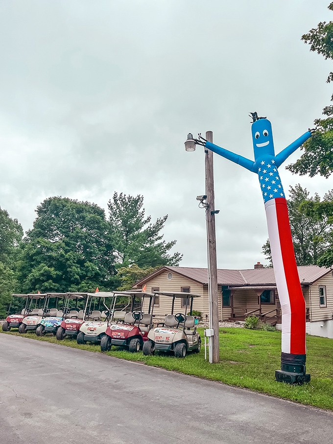 The golf cart brigade stands ready for adventure, each one a chariot of leisure for exploring every corner of this summer paradise.