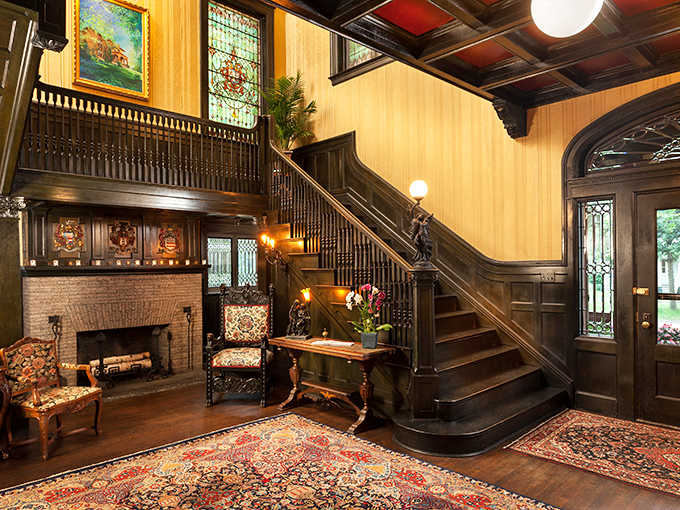 A staircase so magnificent it makes you want to practice your dramatic entrances or perhaps announce dinner like it's 1899.