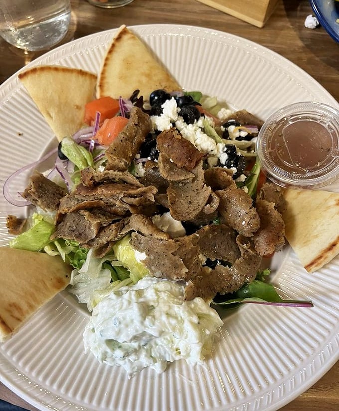 A Greek salad that would make Zeus himself weep with joy – fresh veggies, kalamata olives, and generous feta chunks.