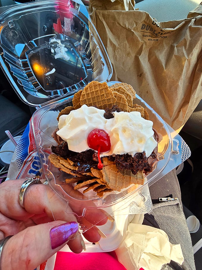 Whoever invented this brilliant dessert deserves a Nobel Prize – crispy waffle pieces swimming in ice cream and toppings create an unexpected masterpiece.