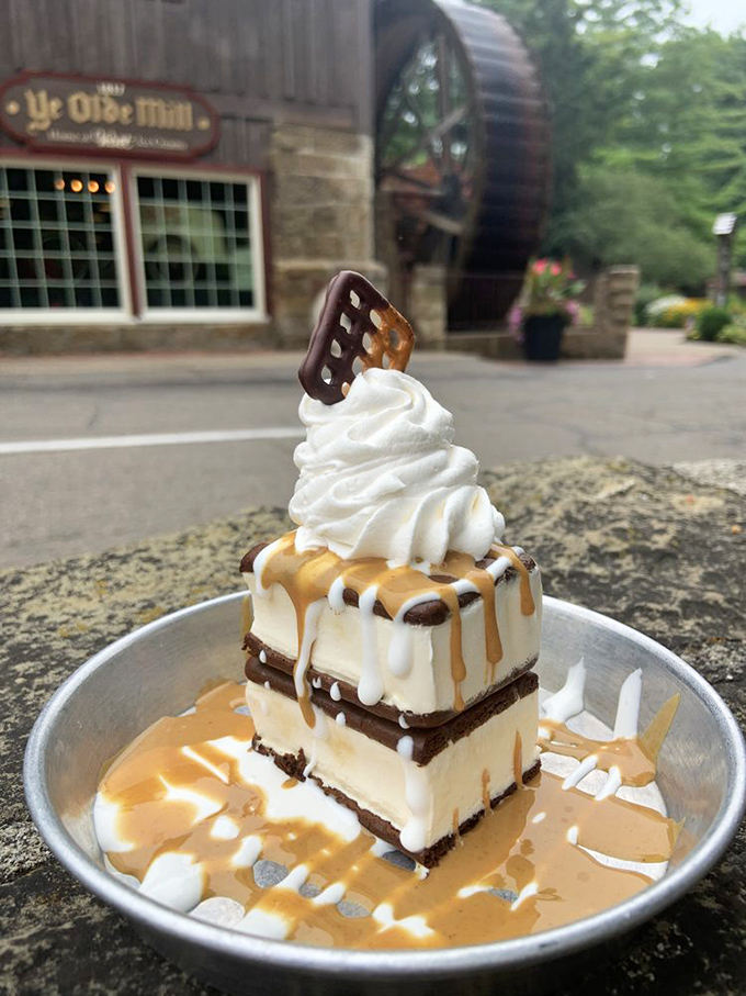 This isn't just dessert, it's architectural genius – layers of Velvet ice cream and chocolate stacked higher than your willpower can resist.