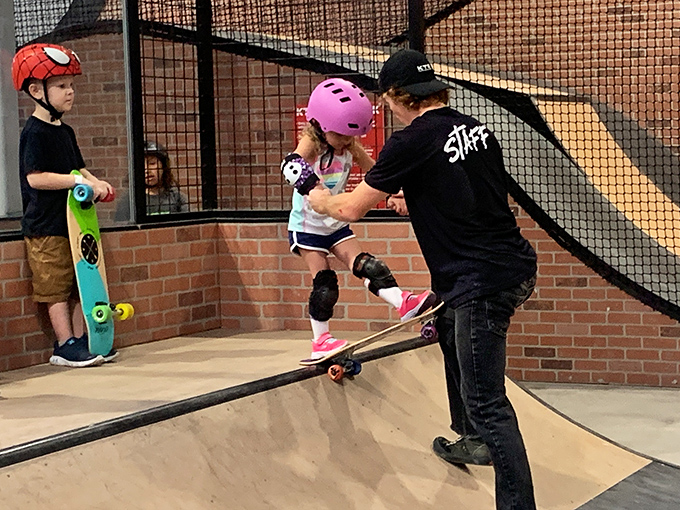 Future X-Games champions start somewhere! KTR's skateboarding instruction transforms wobbly first-timers into confident riders under watchful staff guidance.