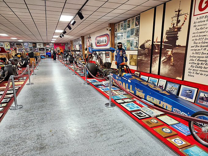 Racing memorabilia lines the walls like a speed-obsessed teenager's dream bedroom, only with actual history instead of just posters from Hot Rod magazine.