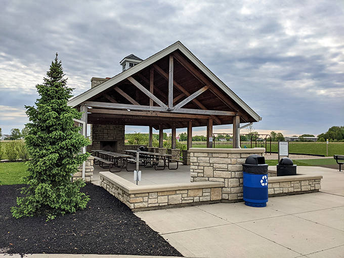 The park's rustic pavilion offers a perfect respite from play – gather the family for picnics or celebrations under its sturdy timber roof.