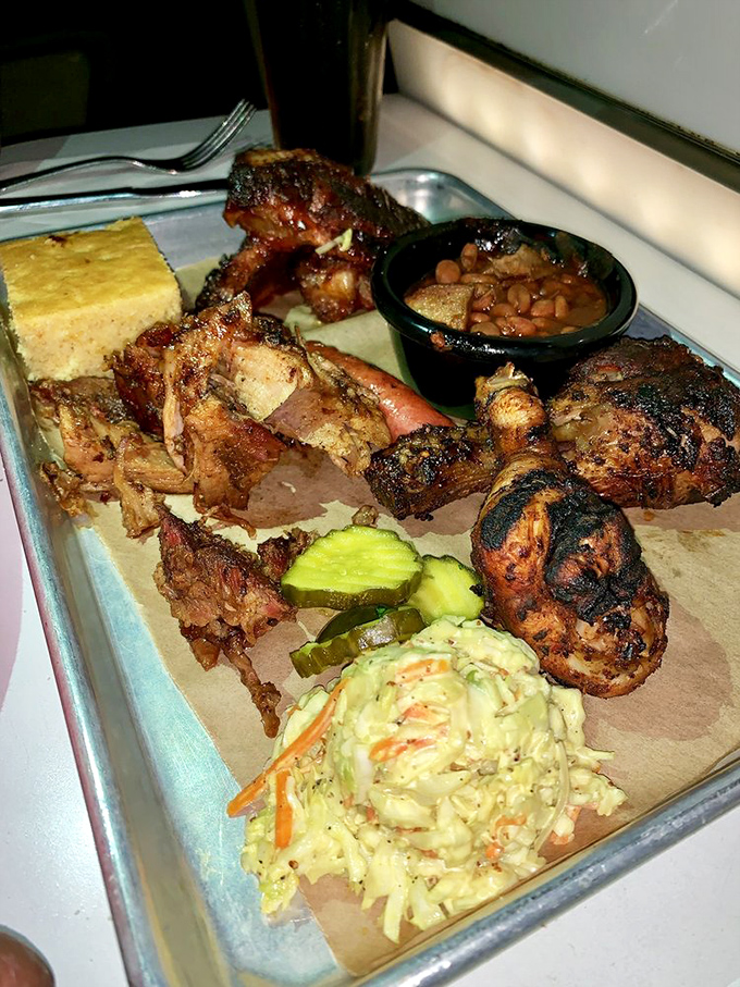 This BBQ platter doesn't mess around&mdash;ribs, chicken, brisket, beans, and cornbread arrive ready to fuel your own personal space mission.