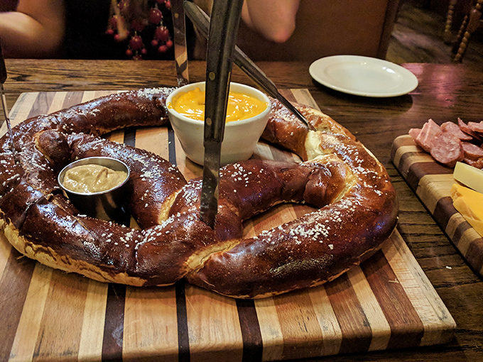 A pretzel that demands respect, served with beer cheese spread and Bavarian mustard, this isn't your average mall snack.