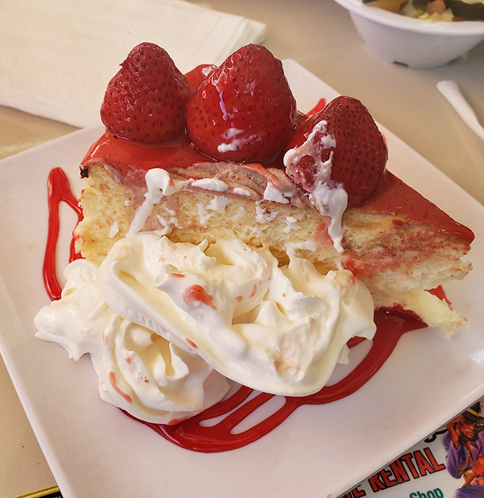 This strawberry cheesecake isn't just dessert&mdash;it's a religious experience with whipped cream. The kind that makes you question all your previous dessert choices.