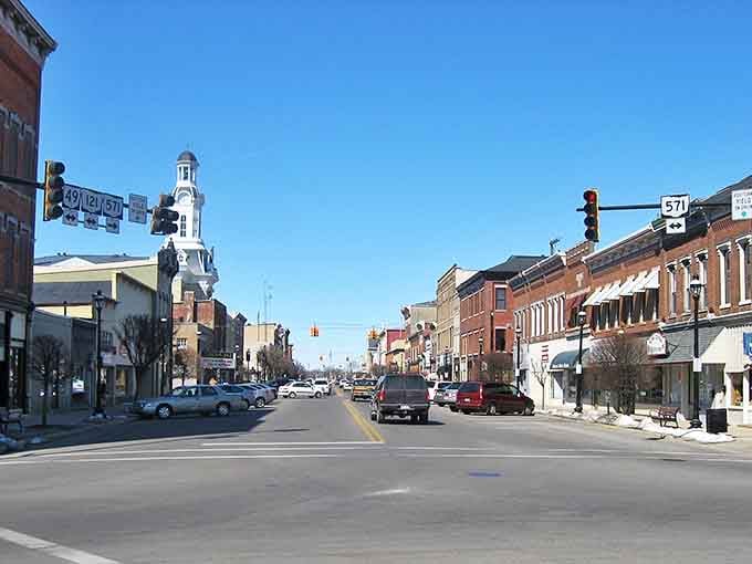 Main Street stretches toward the horizon, lined with brick buildings that have witnessed generations of parades, first dates, and daily life in this charming Ohio town.