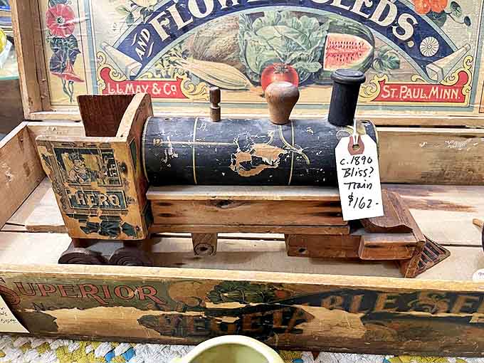 This vintage wooden train toy whispers of childhoods past, its weathered surface telling tales of imaginative journeys taken decades ago.