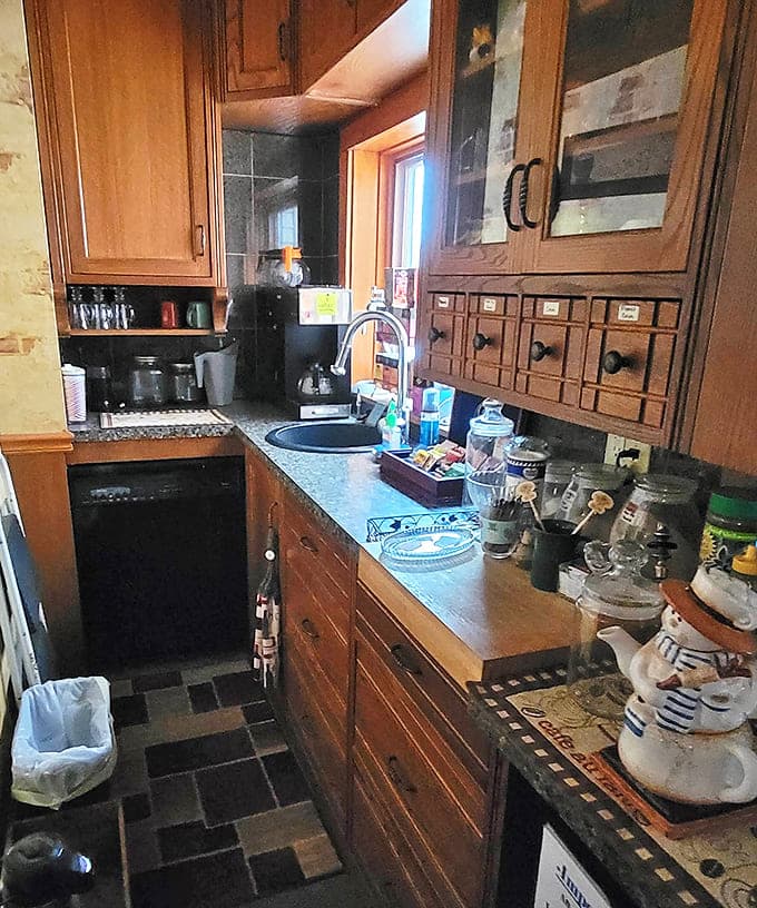 Not your average coffee station! This charming kitchen nook offers modern conveniences while maintaining its historical character.