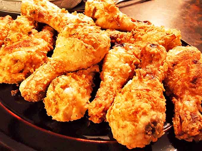 Golden-brown perfection on a plate &ndash; this fried chicken achieves that mythical balance of crackling crisp exterior and juicy, tender meat within.