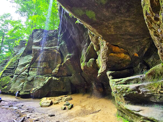 Water meets stone in this enchanting overhang, where centuries of persistent droplets have sculpted their own architectural marvel.