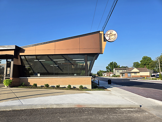 Kruta Bakery's modern exterior houses old-world European baking traditions. The outdoor seating invites you to enjoy your pastries in the fresh air.