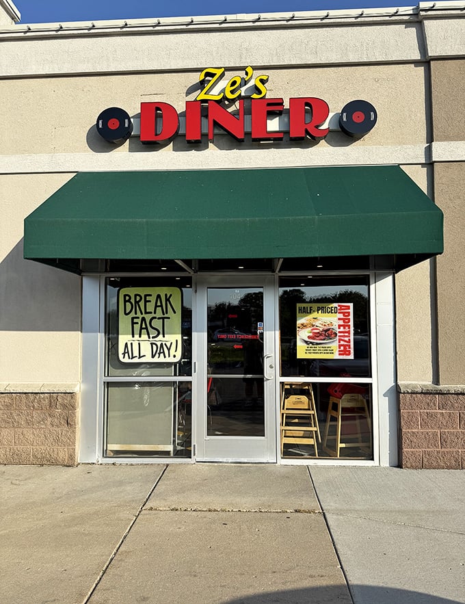 Ze's Diner announces itself with bold red letters and vinyl record decorations, promising breakfast all day in Prior Lake.